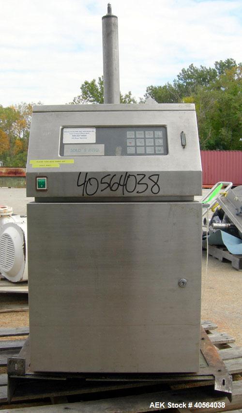 Used Domino Ink Jet Coder, Model Solo 5. Includes a pedestal stand.