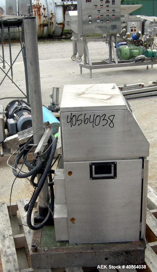 Used Domino Ink Jet Coder, Model Solo 5. Includes a pedestal stand.