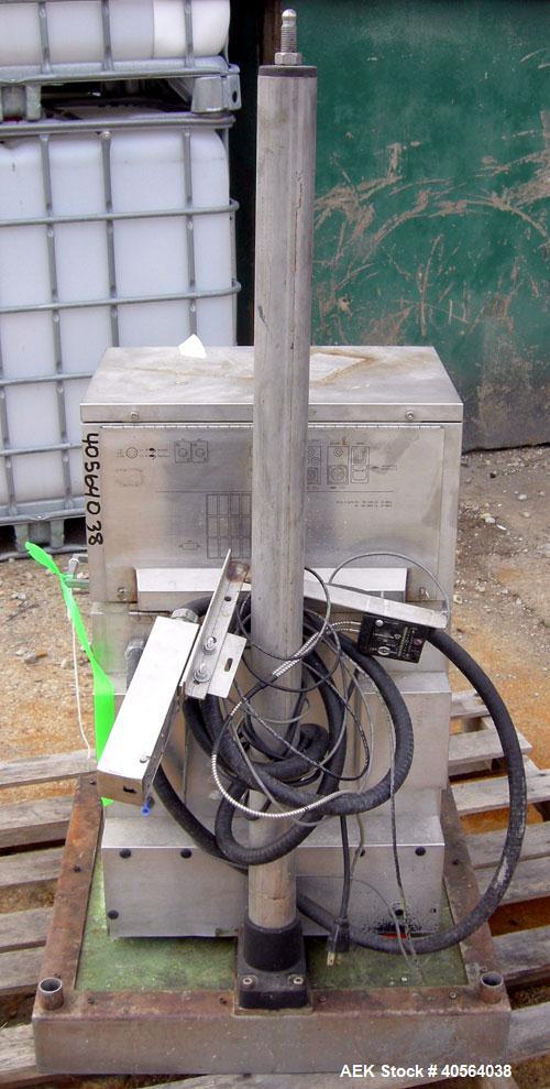 Used Domino Ink Jet Coder, Model Solo 5. Includes a pedestal stand.