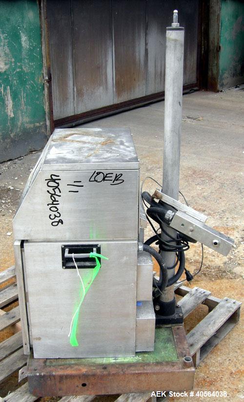 Used Domino Ink Jet Coder, Model Solo 5. Includes a pedestal stand.