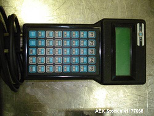 Used Videojet Focus 1000 Laser Coder with adjustable stand, model J21