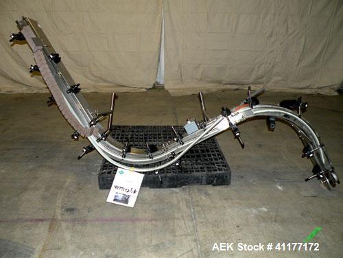 Used Garvey 9600 Tabletop Conveyor. Has two 90 deg turns in an S curv