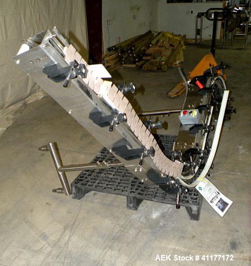 Used Garvey 9600 Tabletop Conveyor. Has two 90 deg turns in an S curv