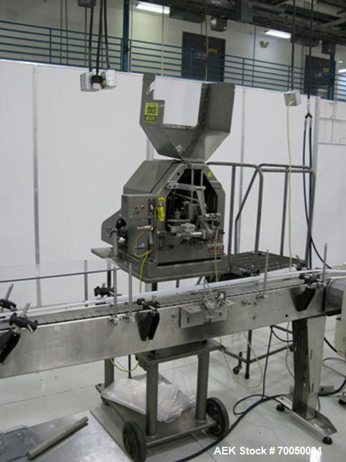 Used Lakso Single Head Inline Cottoner, model 52. Cottoner can perfor