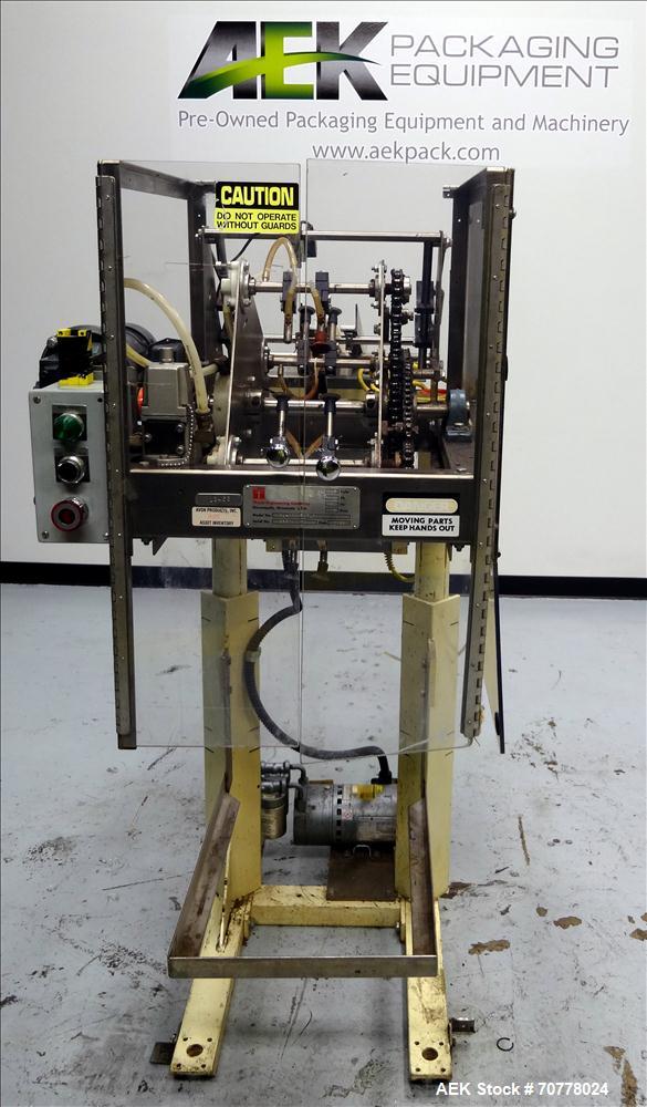 Used Thiele Engineering Model 34-000 Rotary Coupon Placer. Has magazi