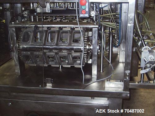 UsedPack Line PXM-5 Cup Filling and Sealing Machine. Unit is a five l