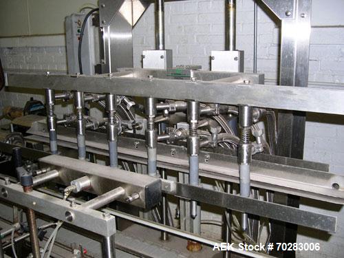 Used ELF Model C06 Inline Gravity / Pressure Liquid Filler. Machine