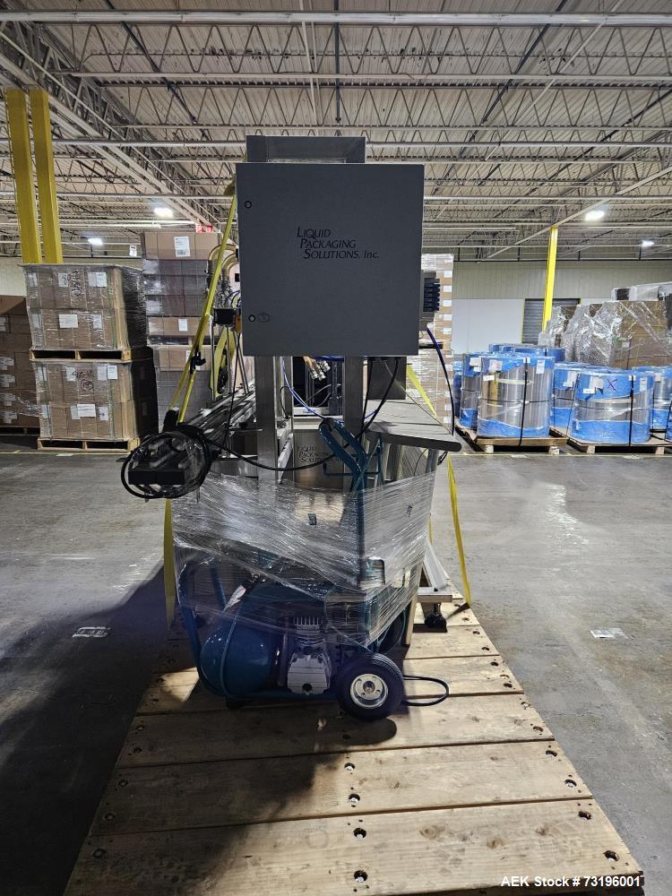 Used Liquid Packaging Solutions 4 Head semi-automatic inline gravity