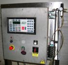 Used ELF Model C06 Inline Gravity / Pressure Liquid Filler. Machine