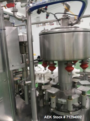 Used Federal Two component filler capper. Equipped with (8) filling h