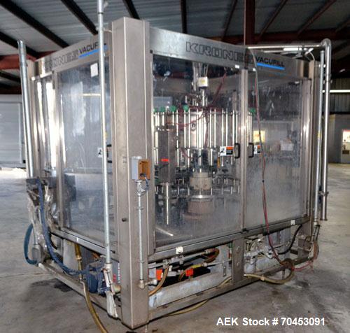 Used Krones 28 Head Model VV 28-107 Vacufill Rotary Vacuum Filler. Co