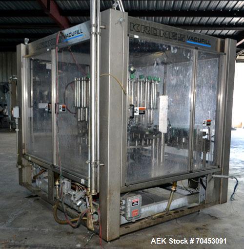 Used Krones 28 Head Model VV 28-107 Vacufill Rotary Vacuum Filler. Co