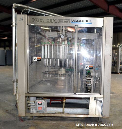 Used Krones 28 Head Model VV 28-107 Vacufill Rotary Vacuum Filler. Co