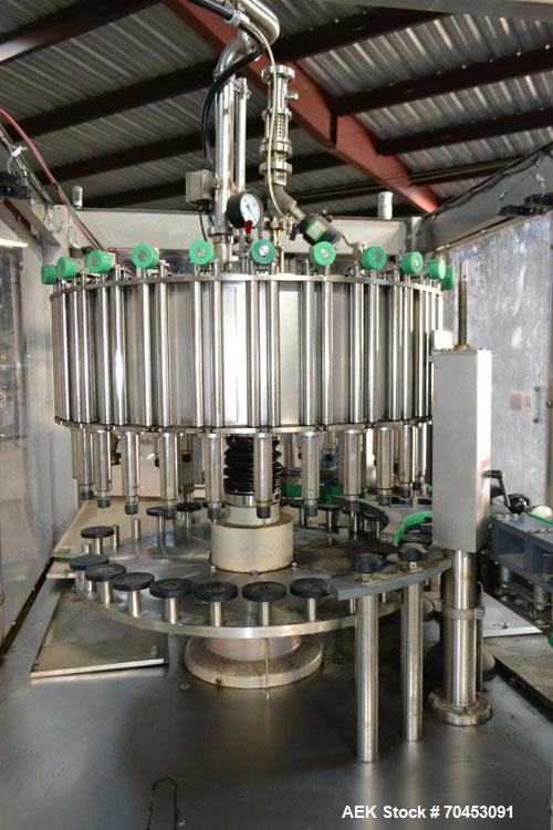 Used Krones 28 Head Model VV 28-107 Vacufill Rotary Vacuum Filler. Co