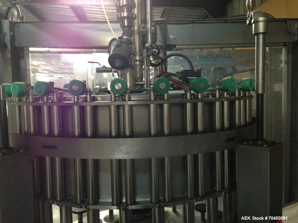 Used Krones 28 Head Model VV 28-107 Vacufill Rotary Vacuum Filler. Co