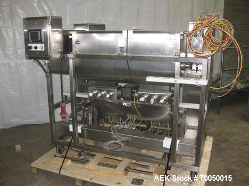 UsedRaque Piston Filler, model PF2.5-6. Equipped with (6) 3.5" diamet