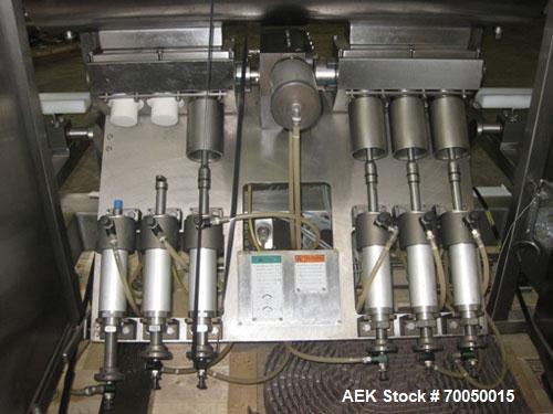 UsedRaque Piston Filler, model PF2.5-6. Equipped with (6) 3.5" diamet