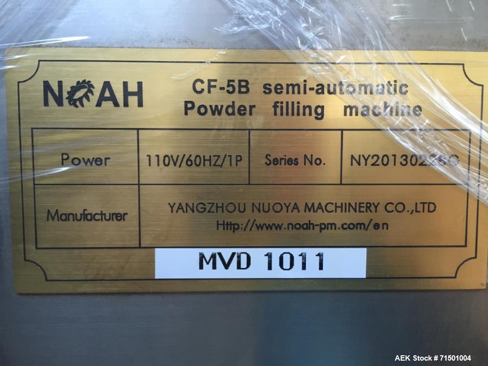 Used Noah Model CF-5B Semi-Automatic Powder Auger Filler. Capable of