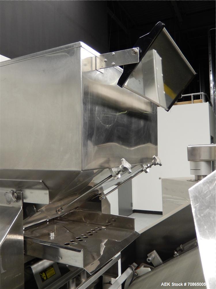 Used Lakso Model 450 Reformer Slat Counter. Machine has a speed range