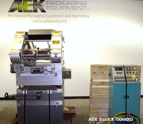 Used Merrill Model 72-16AD Automatic Inline Slat Counter. Filler is c