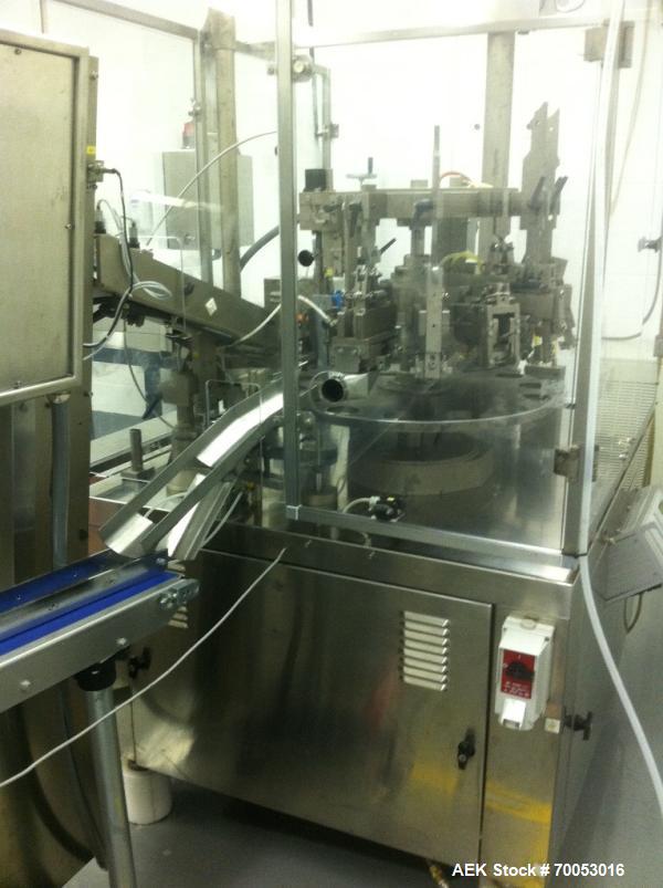 UsedComadis Tube Filler, Model 150U, set up for both plastic and meta