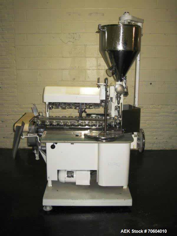 Used Arenco metal tube filler, type GAB, single filler nozzle, manual