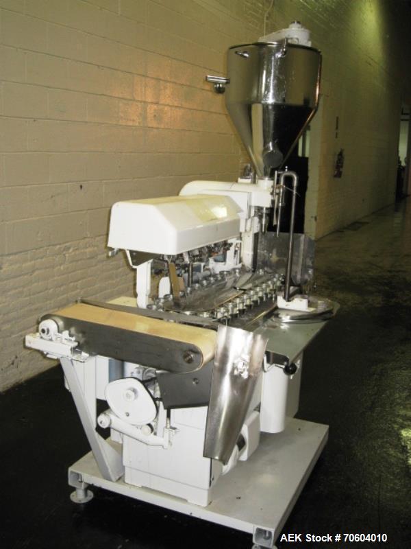 Used Arenco metal tube filler, type GAB, single filler nozzle, manual