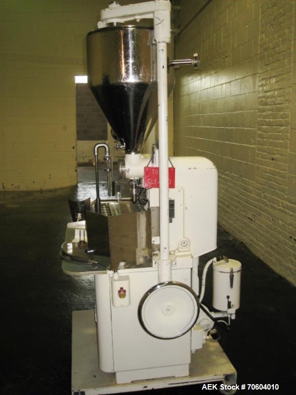 Used Arenco metal tube filler, type GAB, single filler nozzle, manual