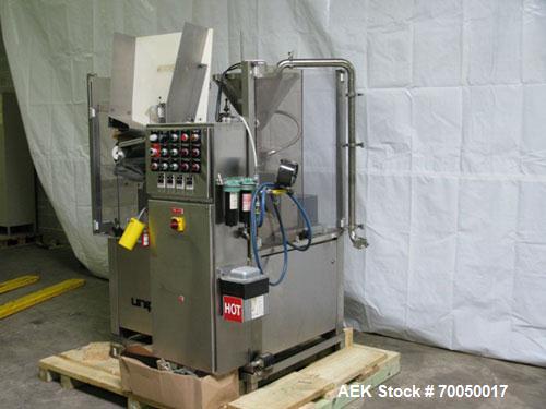 UsedUnipac Model Silver 80 Automatic Plastic Tube Filler, Hot Jaw. 12