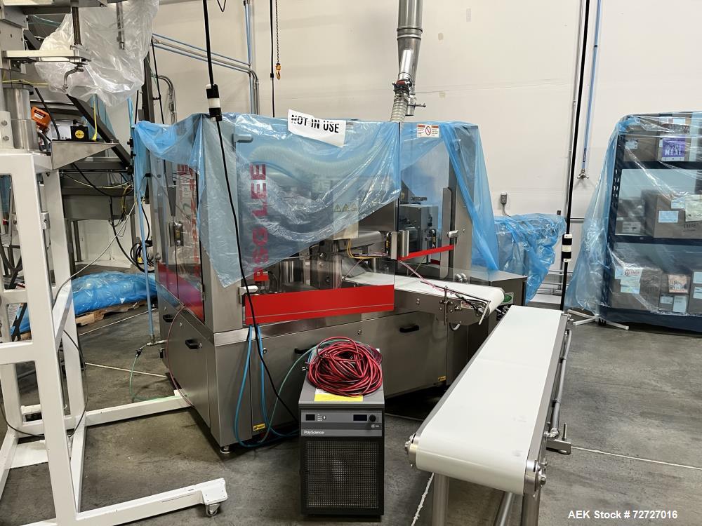 Used PSG Lee Rotary Pre-Made Pouch Packager, Model RP-8TZ (24). (8) s