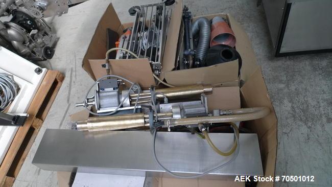 UsedAnker Roland Labeling Machine. Includes drive belts, spare parts