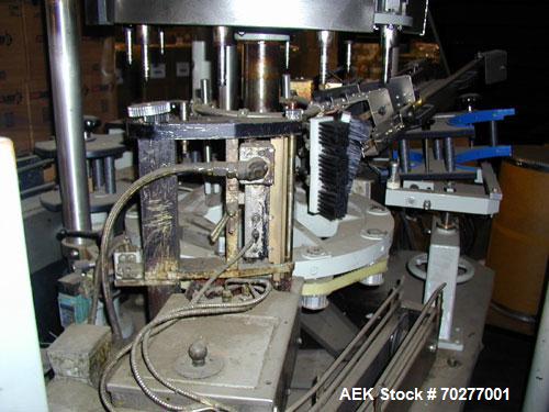 Used Krones Canmatic 10 Station hot glue wraparound labeler.