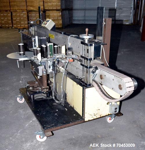 Used LSI UPA II Print and Apply Labeler. Has Zebra print engine. Spot