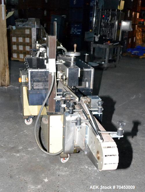 Used LSI UPA II Print and Apply Labeler. Has Zebra print engine. Spot