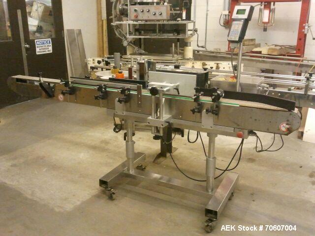 Used CVC-300 Vertical Wrap Labeler. Designed for round products. Self