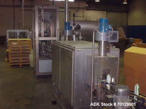 UsedComag Shrink Sleeve for Aerosol Cans. Nominal speed 12,000 cans/h