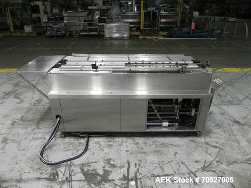 Used Cozzoli Model BT-400 Vial Tray Loader. The BT-400 Vial Tray Load