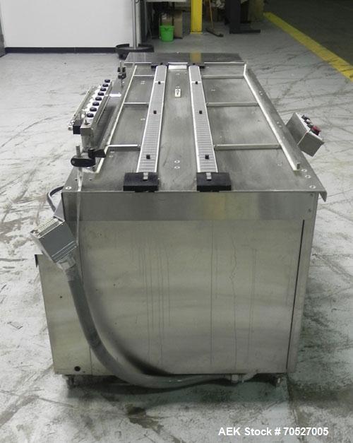 Used Cozzoli Model BT-400 Vial Tray Loader. The BT-400 Vial Tray Load
