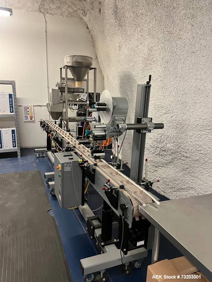 Great Condition, Used Indexing Conveyor and Labeling Line. Includes i