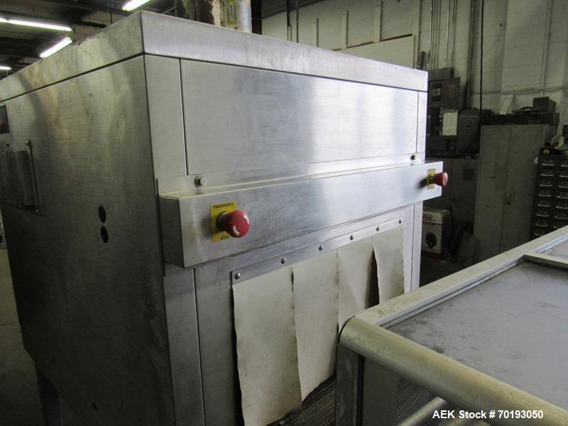UsedShanklin A26ADA L-Bar Sealer and T7H SST Shrink Tunnel; capable o