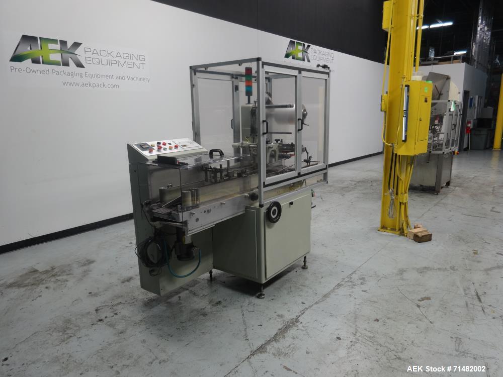 Used Multipack Model F-40 Stretch Wrapper/Shrink Bundler. Machine is