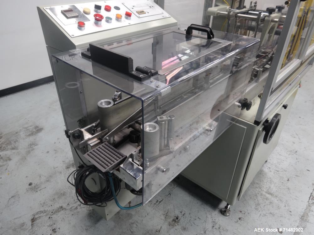 Used Multipack Model F-40 Stretch Wrapper/Shrink Bundler. Machine is