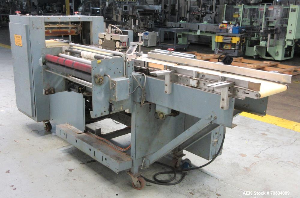 Used Shanklin Model F1 Shrink Wrapper. Machine is rated at up to 50