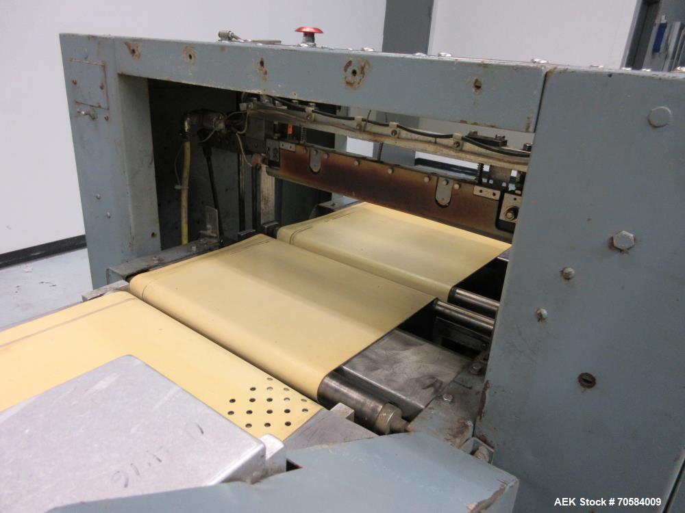 Used Shanklin Model F1 Shrink Wrapper. Machine is rated at up to 50