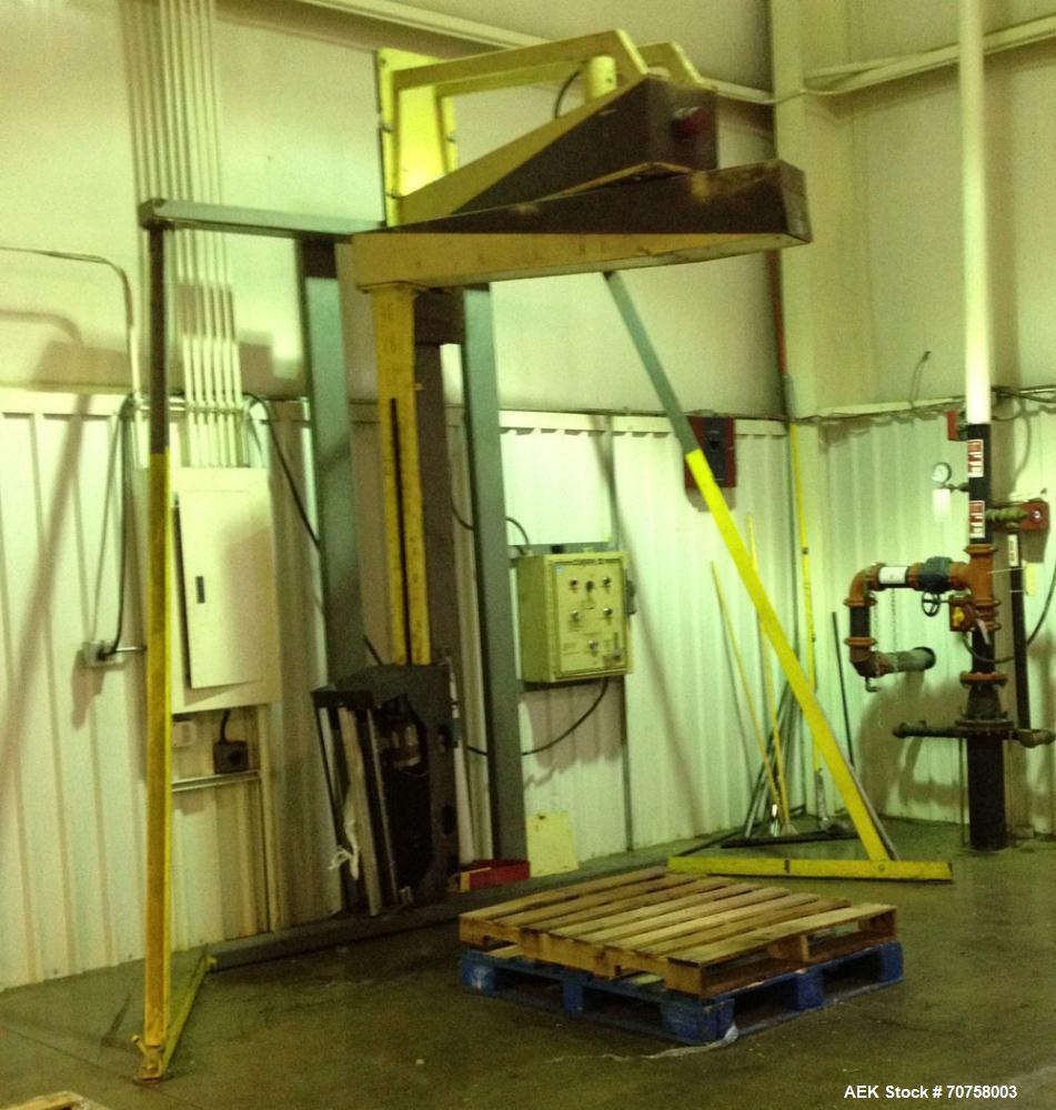 Used ITW Muller Cobra IV Semi-Automatic Rotary Arm Stretch Wrapper. C