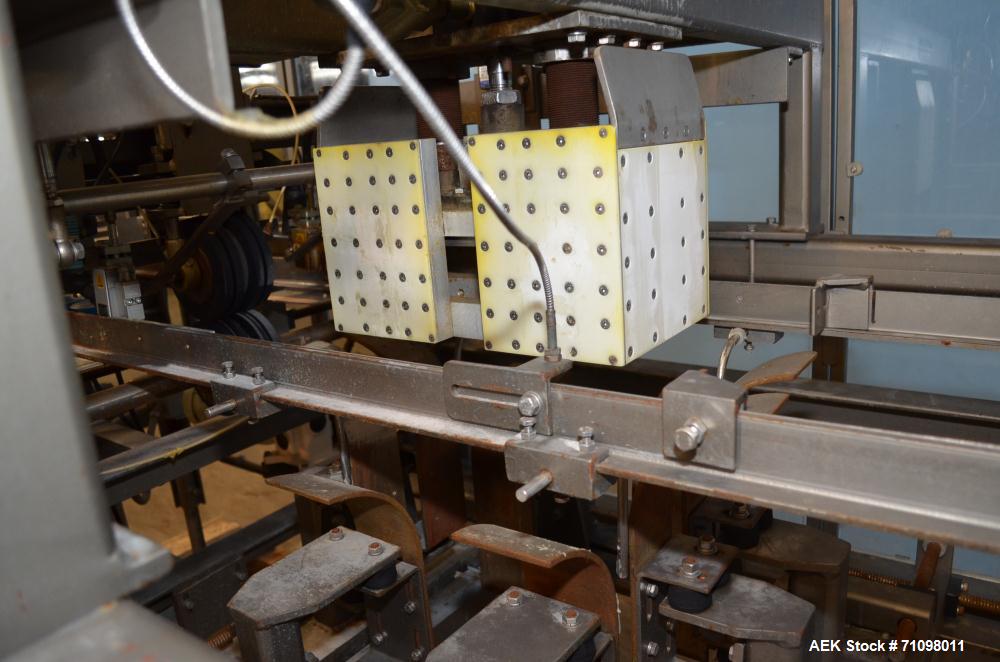 Used Pearson Model H101 Tray Former. Maximum speed of 40 trays per mi