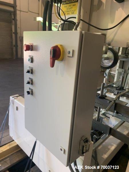 Used SWF Tray Former with Nordson Hot Melt Glue Unit, Model 1T4. Tray