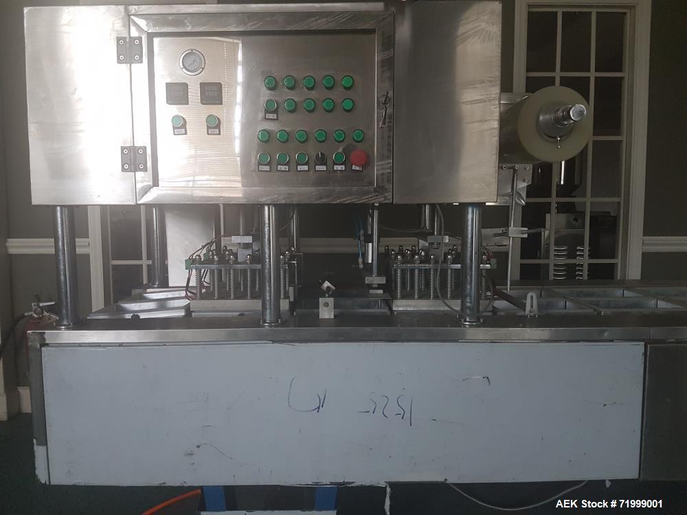 Used Automatic Sealing Machine. 1600 square boxes/hr. Approximately 2