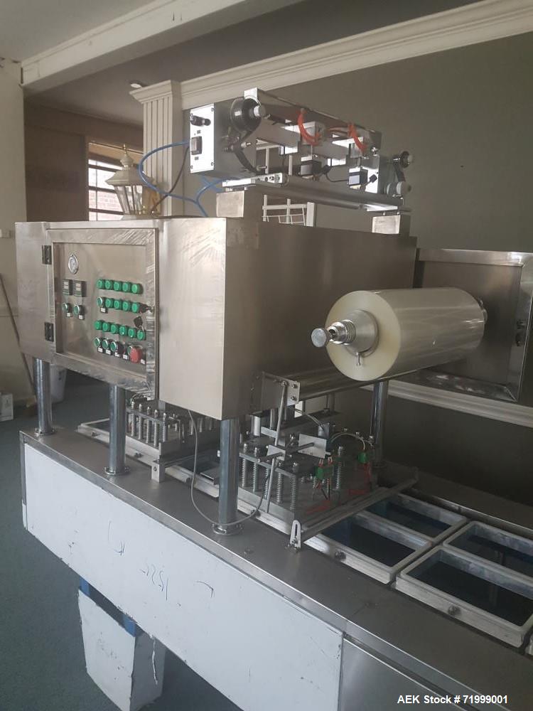 Used Automatic Sealing Machine. 1600 square boxes/hr. Approximately 2