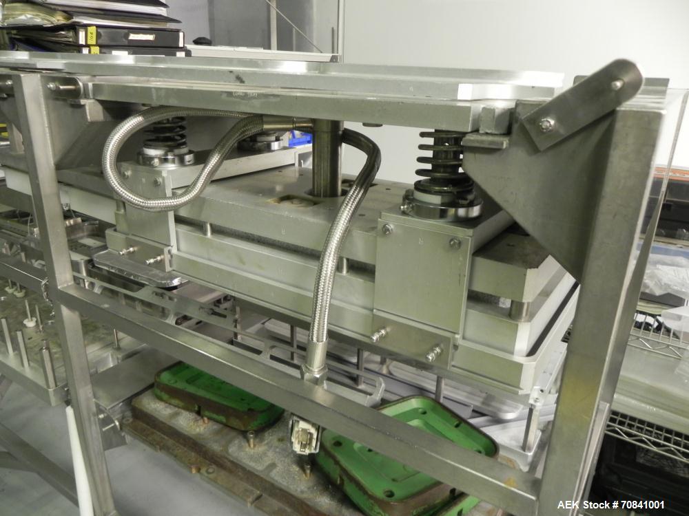 Used G. Mondini Tray and Pan Sealer. Model CVS/T1-S. Machine is capab